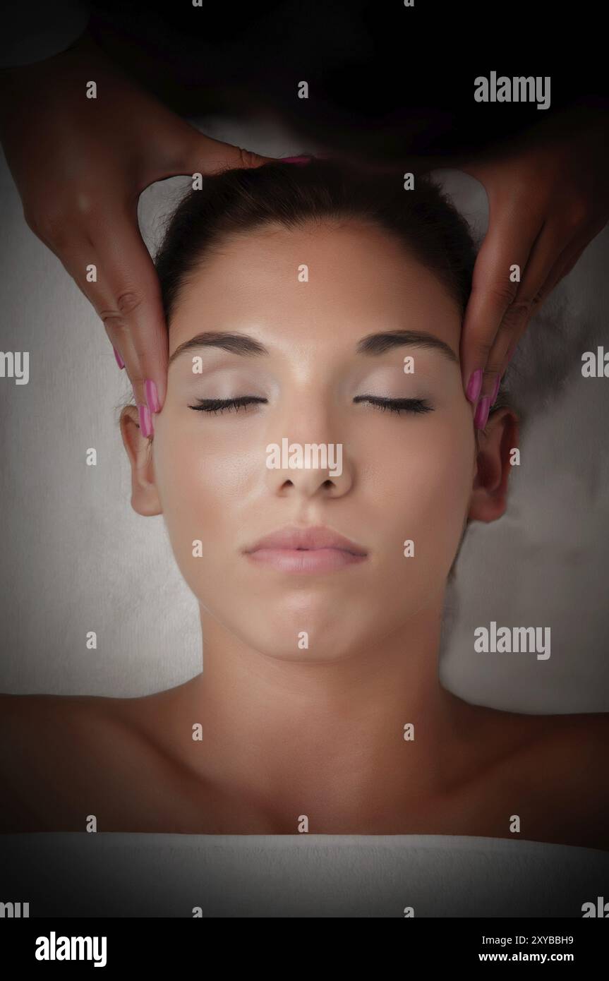 Massage therapist massages womans neck hi-res stock photography and ...