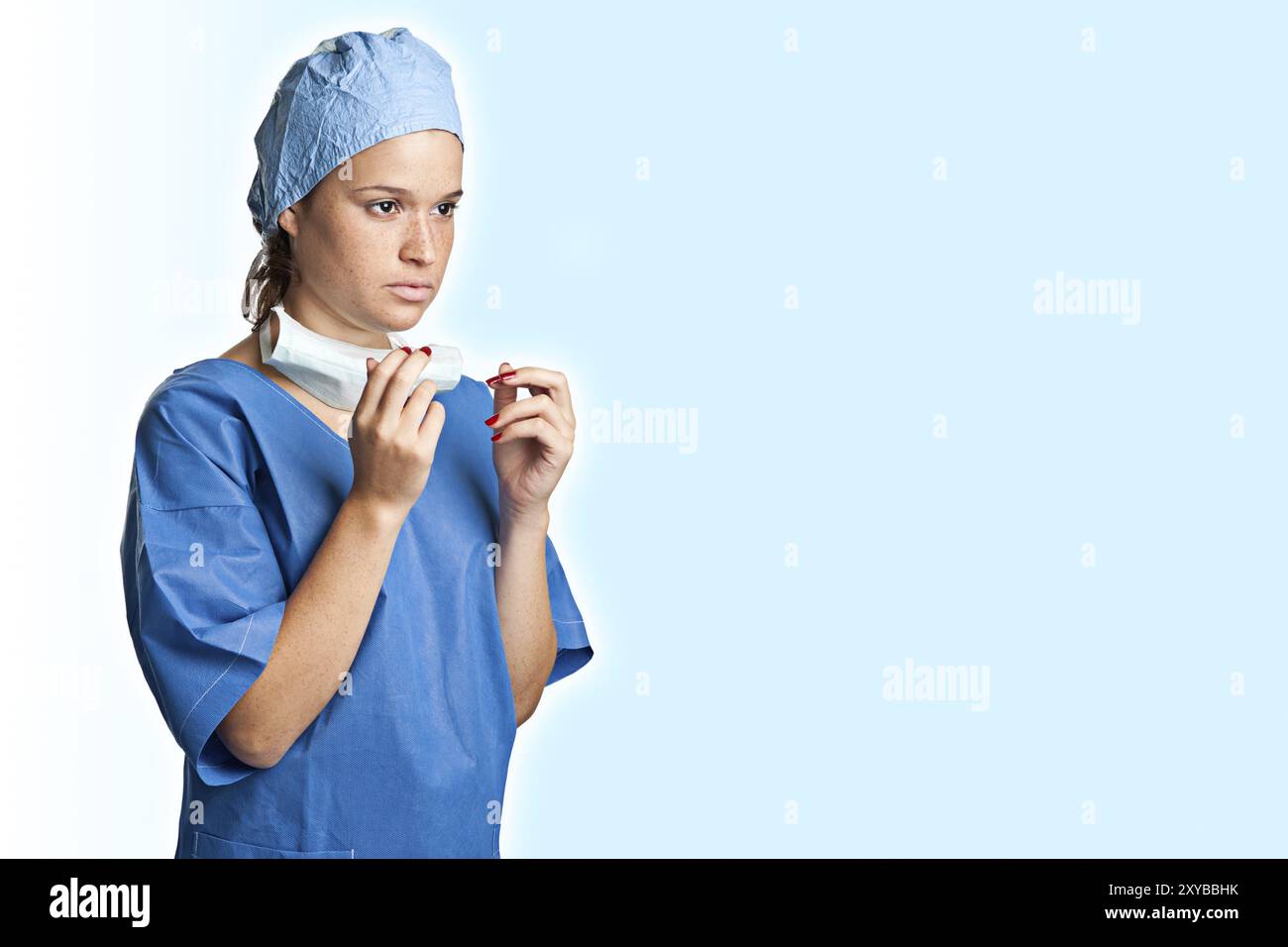 Young female surgeon getting ready for a surgery Stock Photo - Alamy