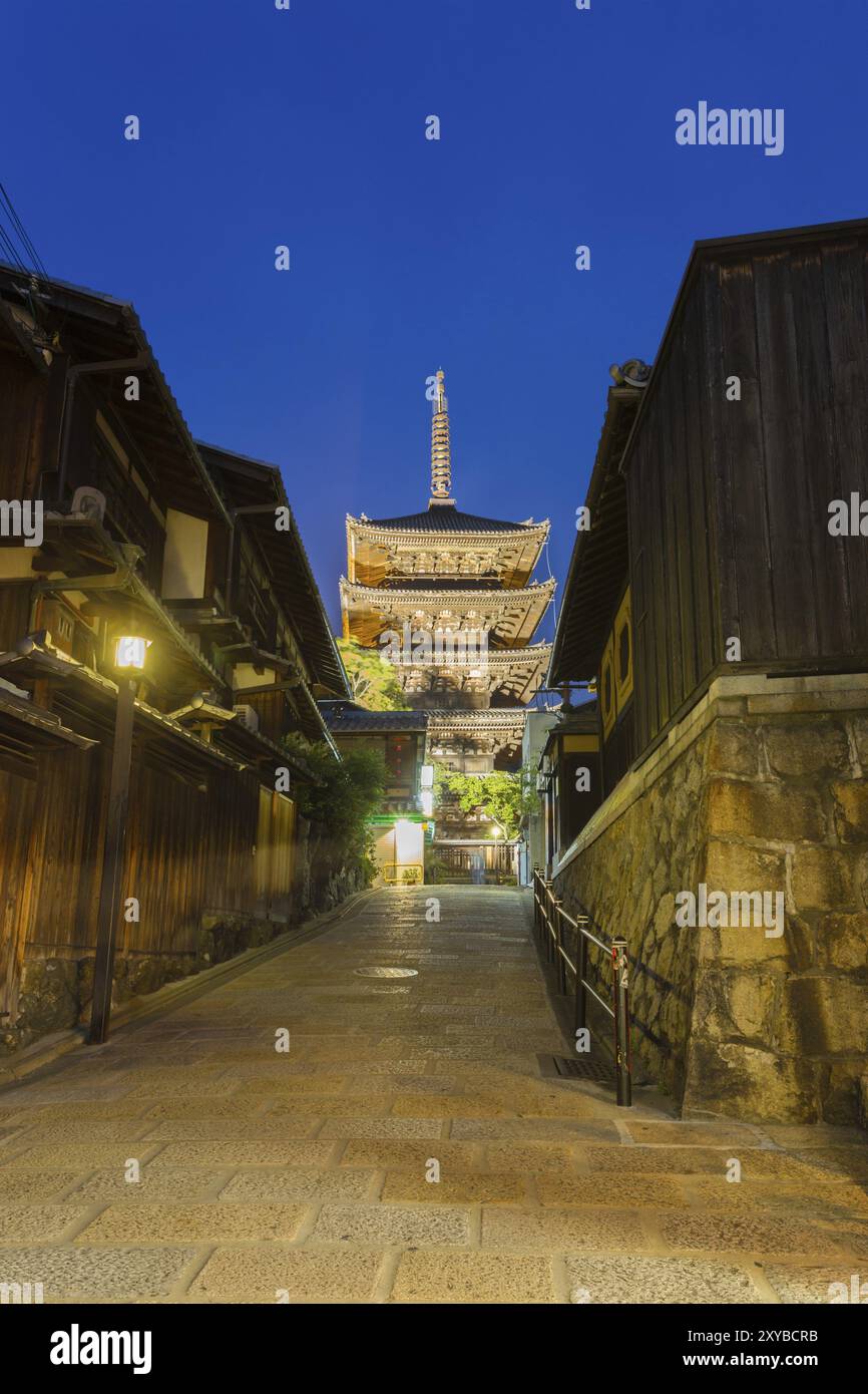 Evening blue hour, wooden traditional houses and empty road leading to ...