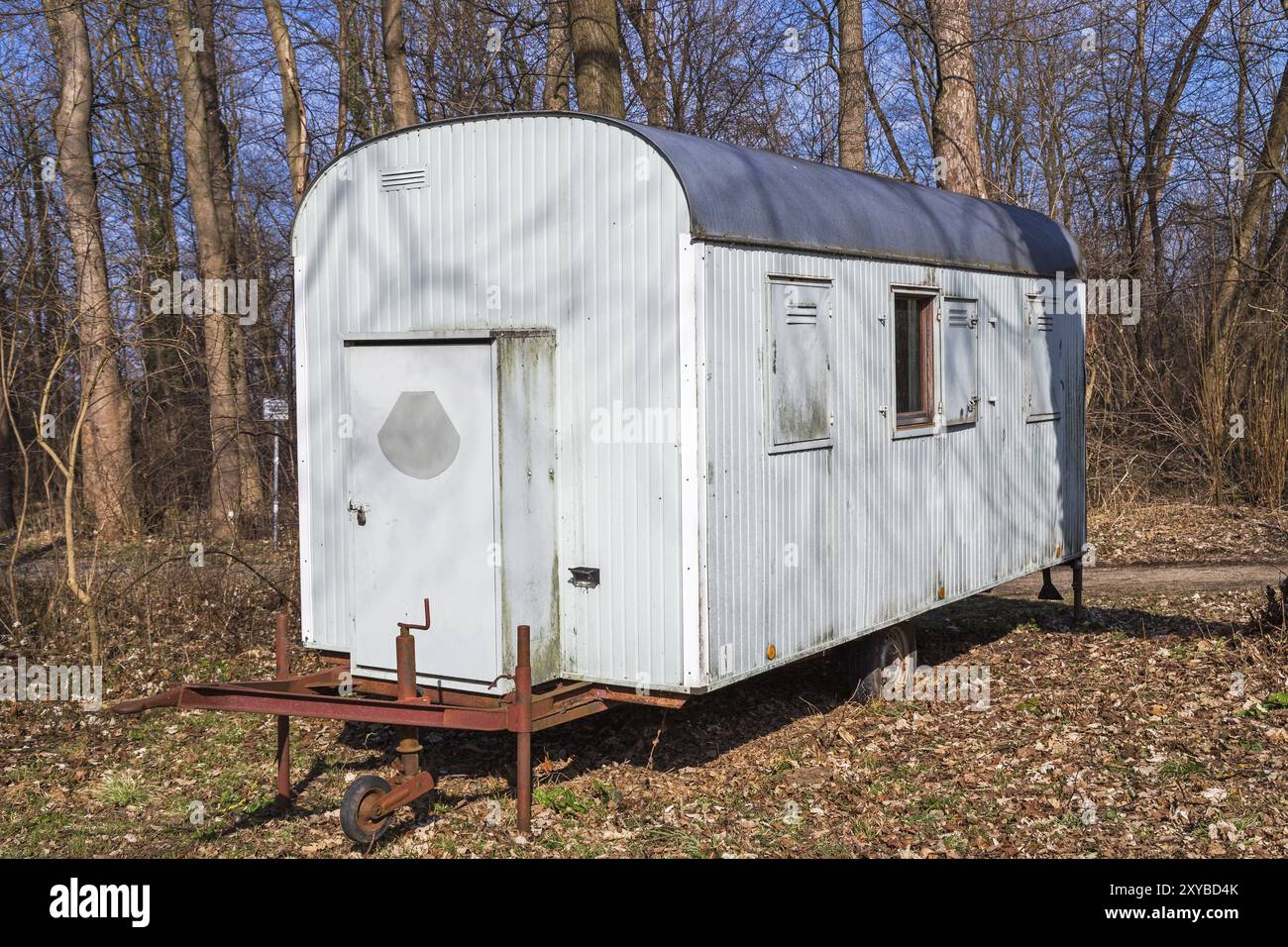Old abandoned caravan in the forest Stock Photo - Alamy
