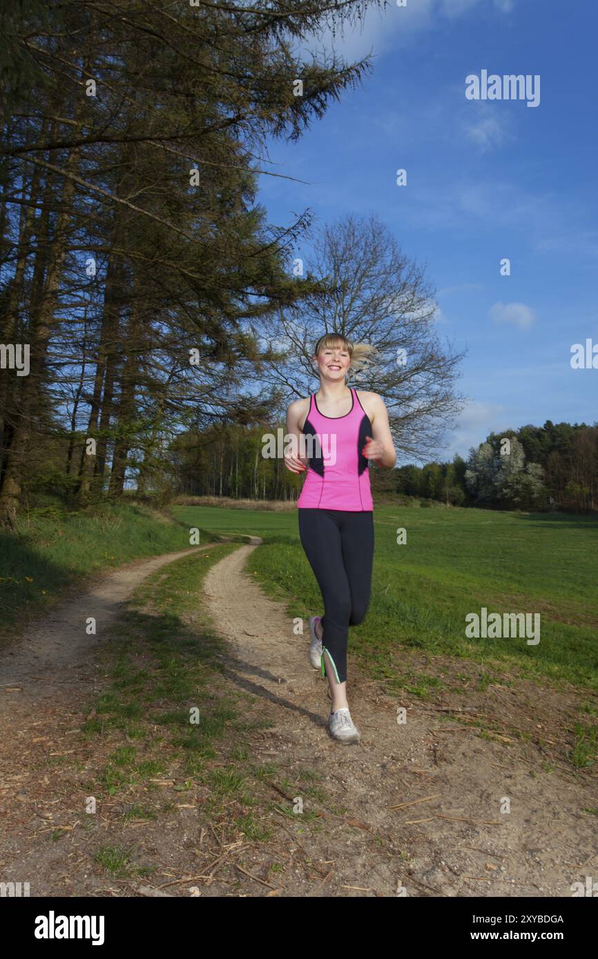 Adult adults woman female jogger runner runners running jogging joggers ...
