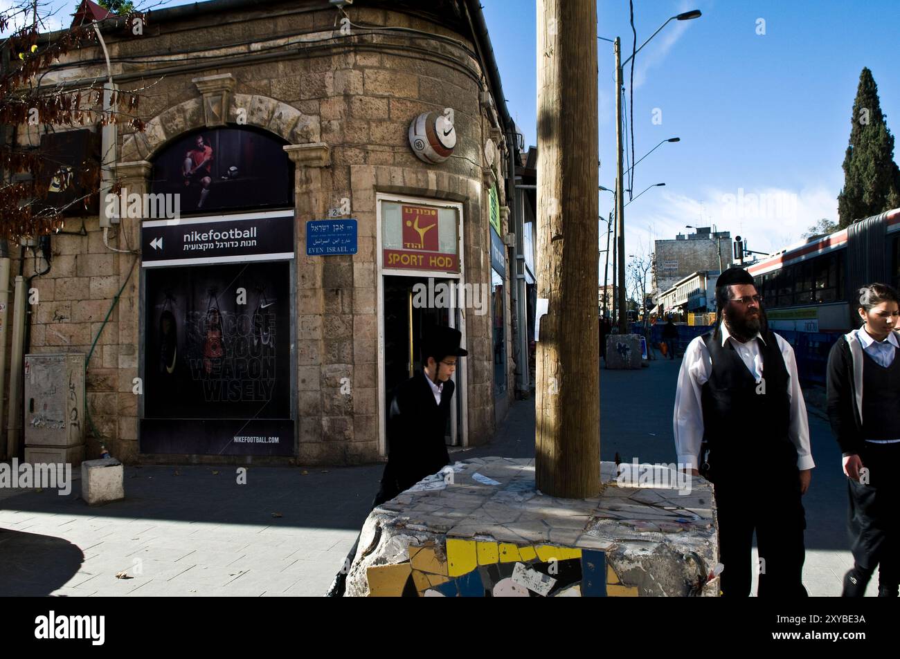 Haredi men walking through the Geula ultra-Orthodox neighborhood in ...