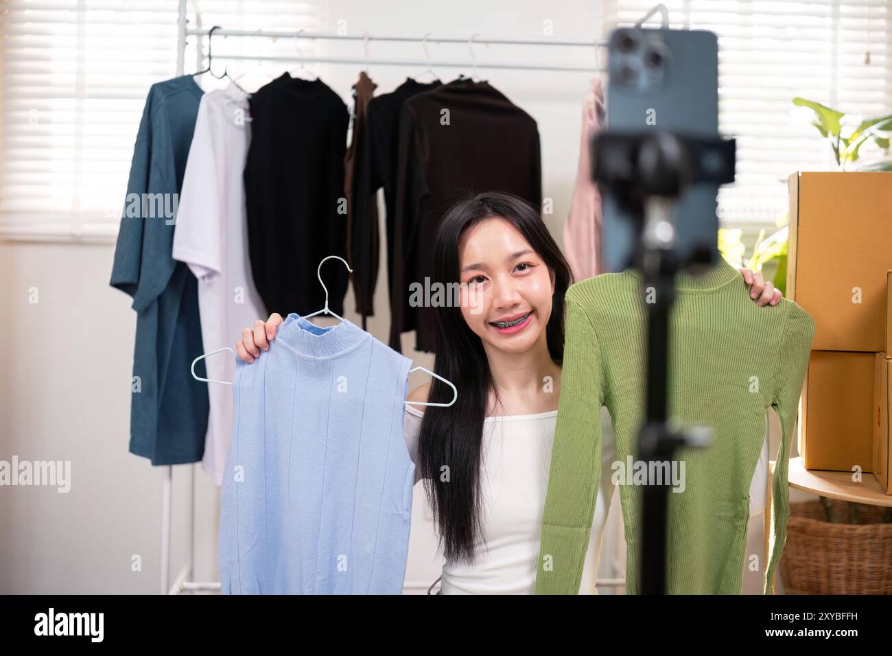 Young woman hosting live hi-res stock photography and images - Alamy