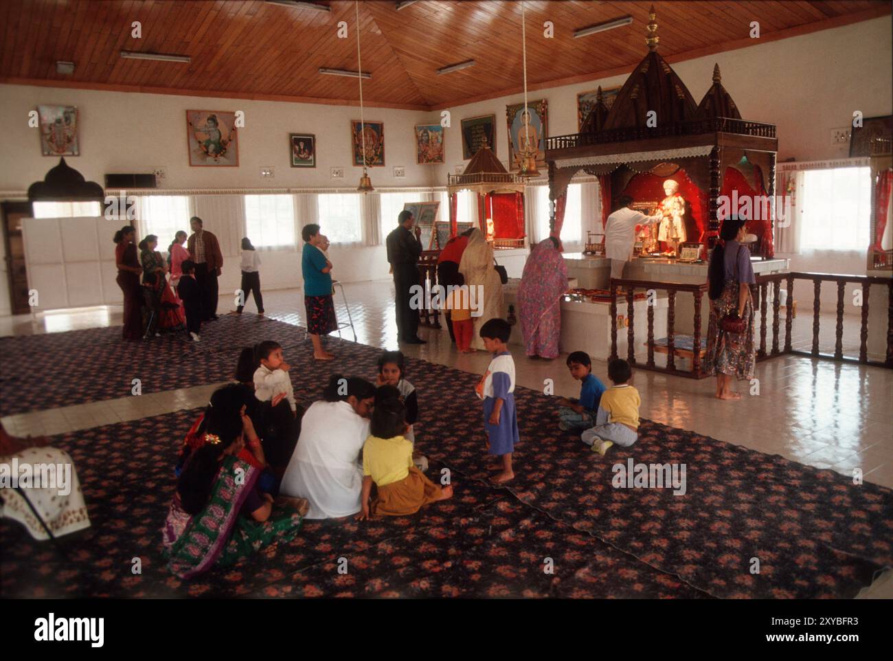Indian people praying at Shree Jalaram Aradhana Temple, Nakuru, Kenya ...