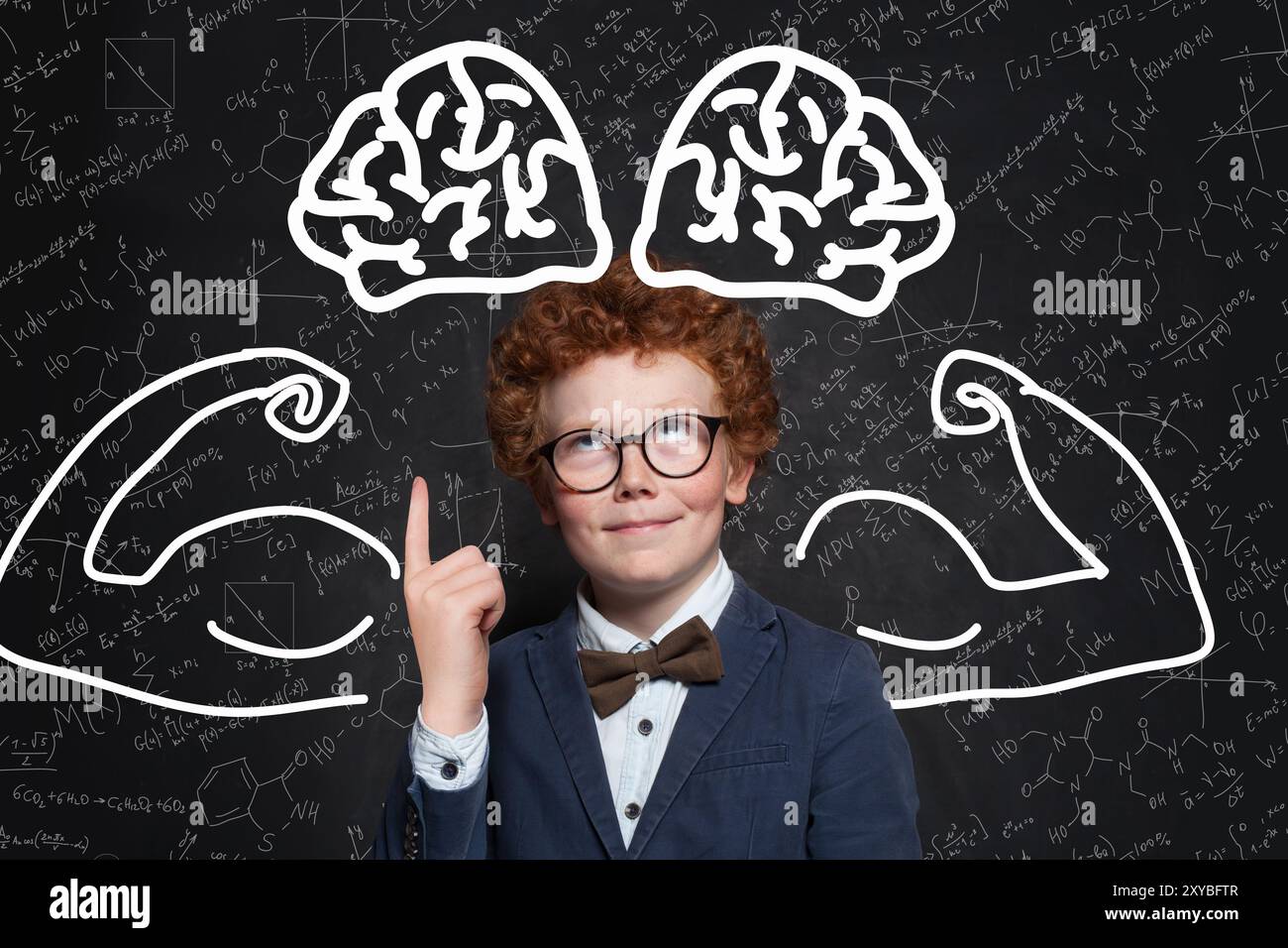 Intelligent child boy with brain on blackboard Stock Photo - Alamy