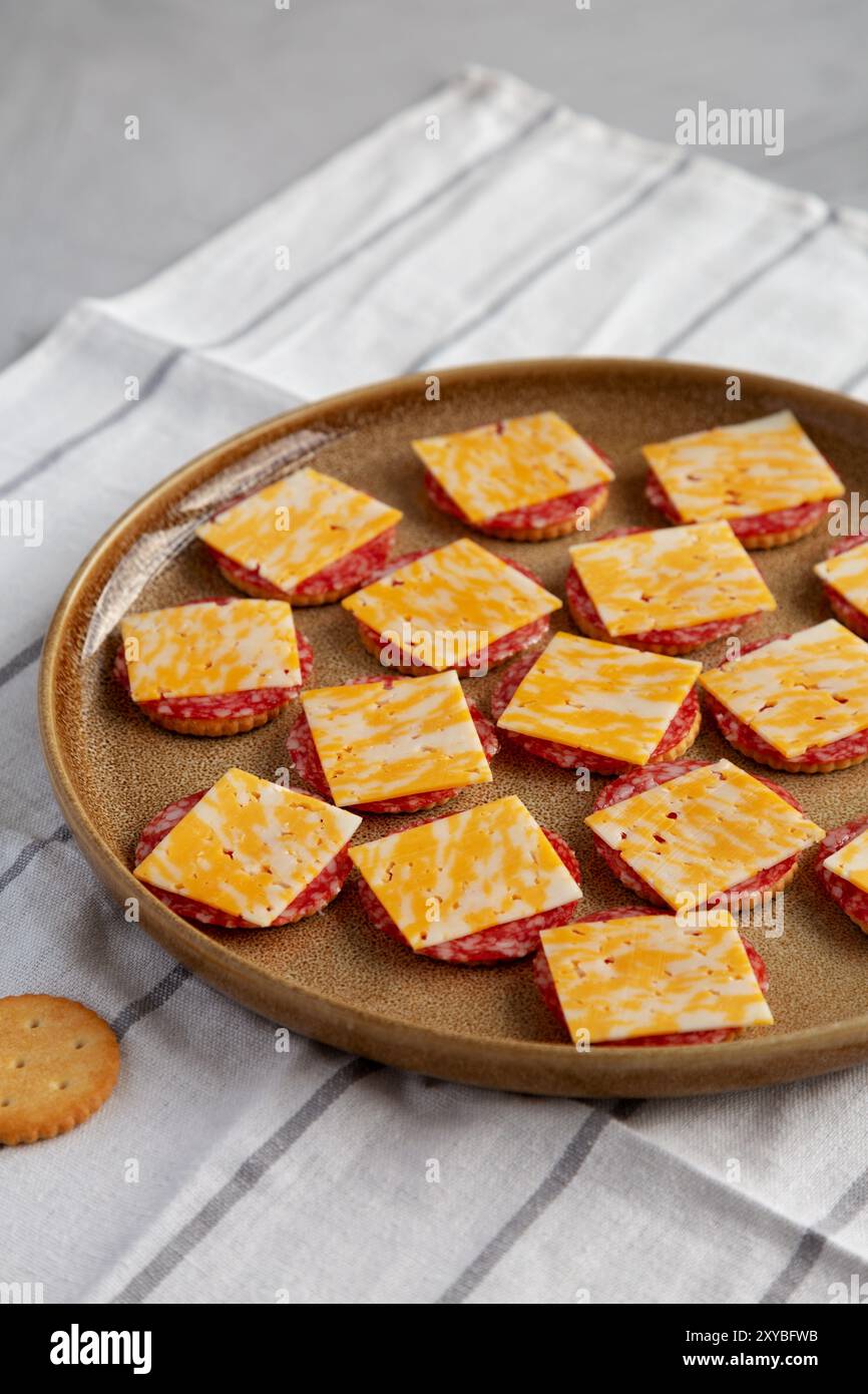 Gourmet Cheese Meat and Crackers on a Plate, side view Stock Photo - Alamy