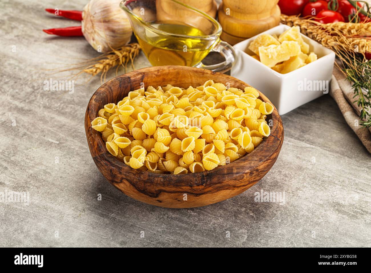 Italian cuisine - dry conchiglie shell pasta Stock Photo - Alamy