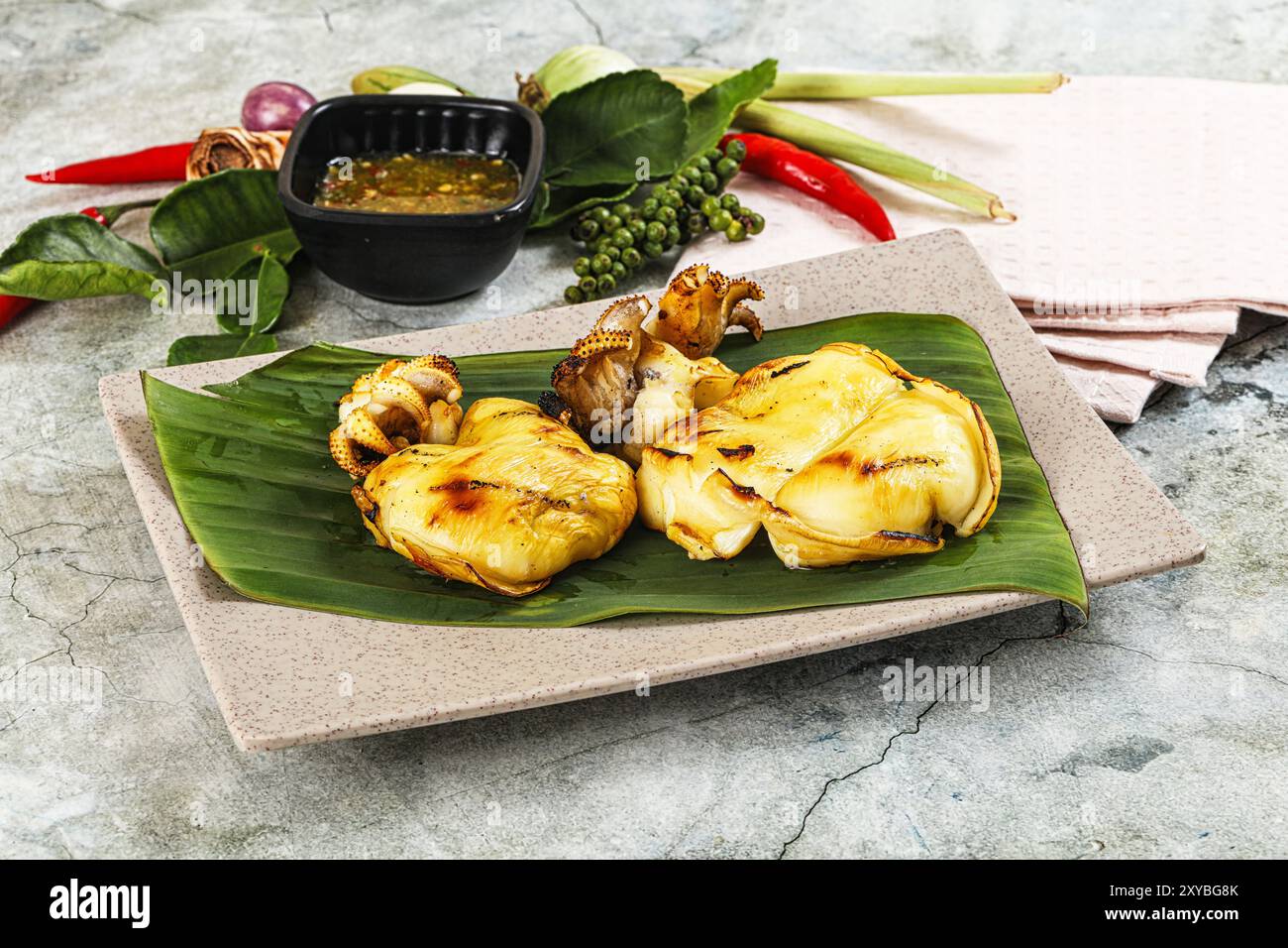 Delicous Grilled cuttlefish with sauce asian style Stock Photo - Alamy