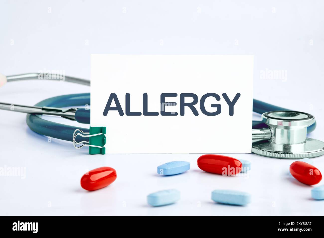 ALLERGY word on a blue background on a white business card. Conceptual ...