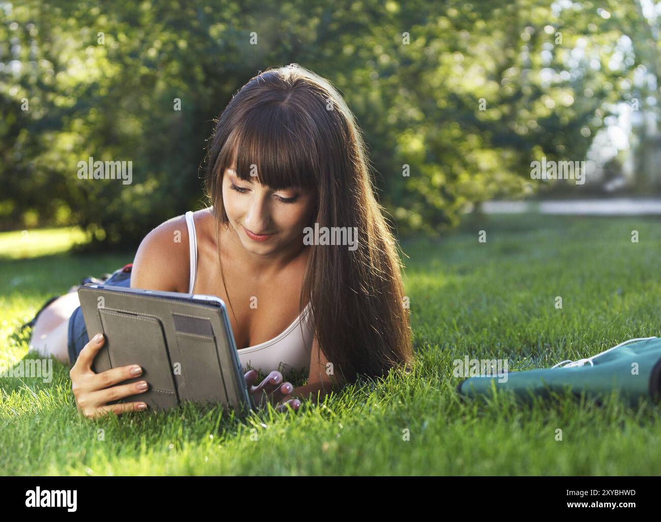 Kids using tablets at school hi-res stock photography and images - Alamy
