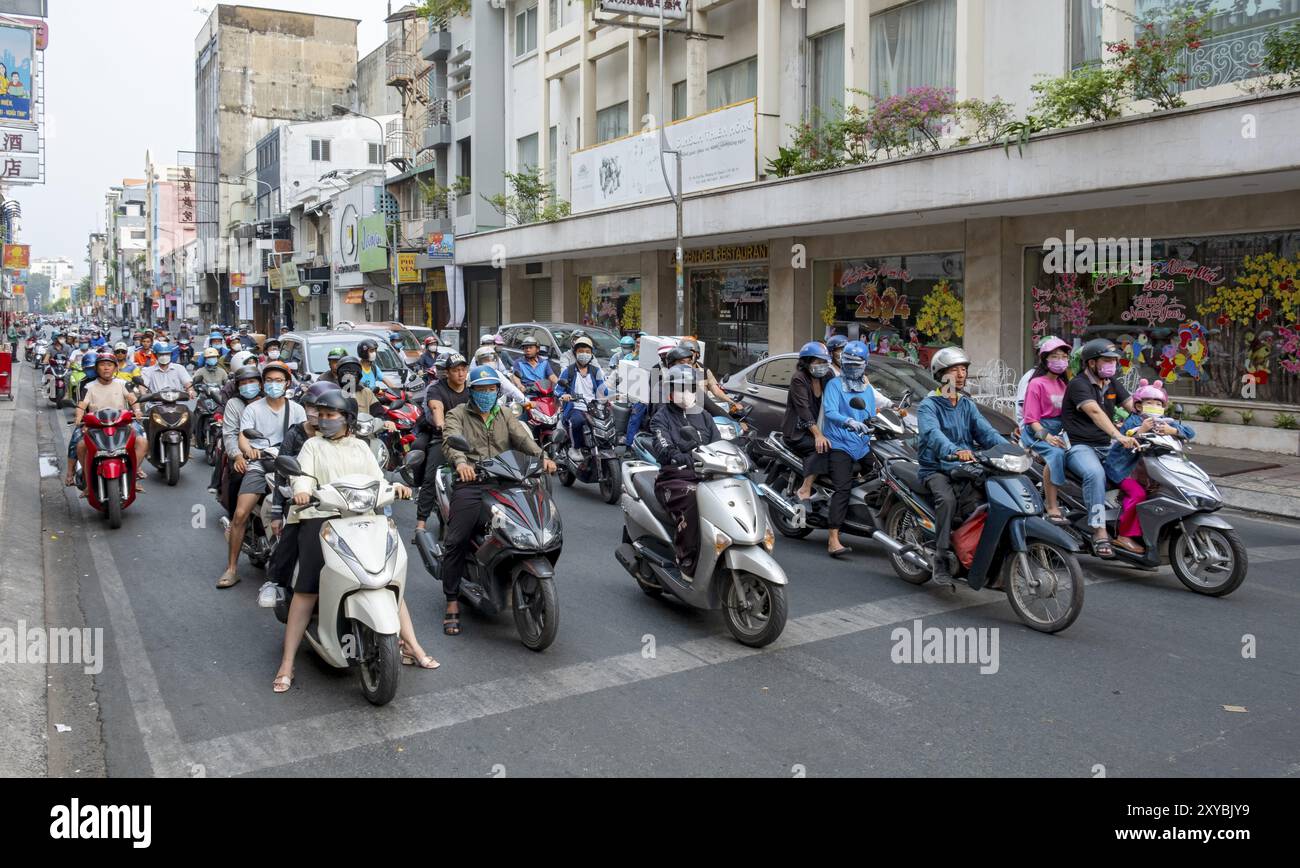 People on Motorcycles in the streets of Saigon, Ho Chi Minh City ...
