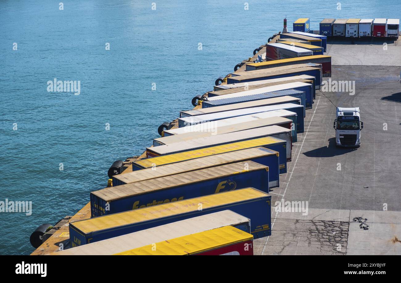 Container and lorry trailer in the port of Barcelona, Spain, Europe ...