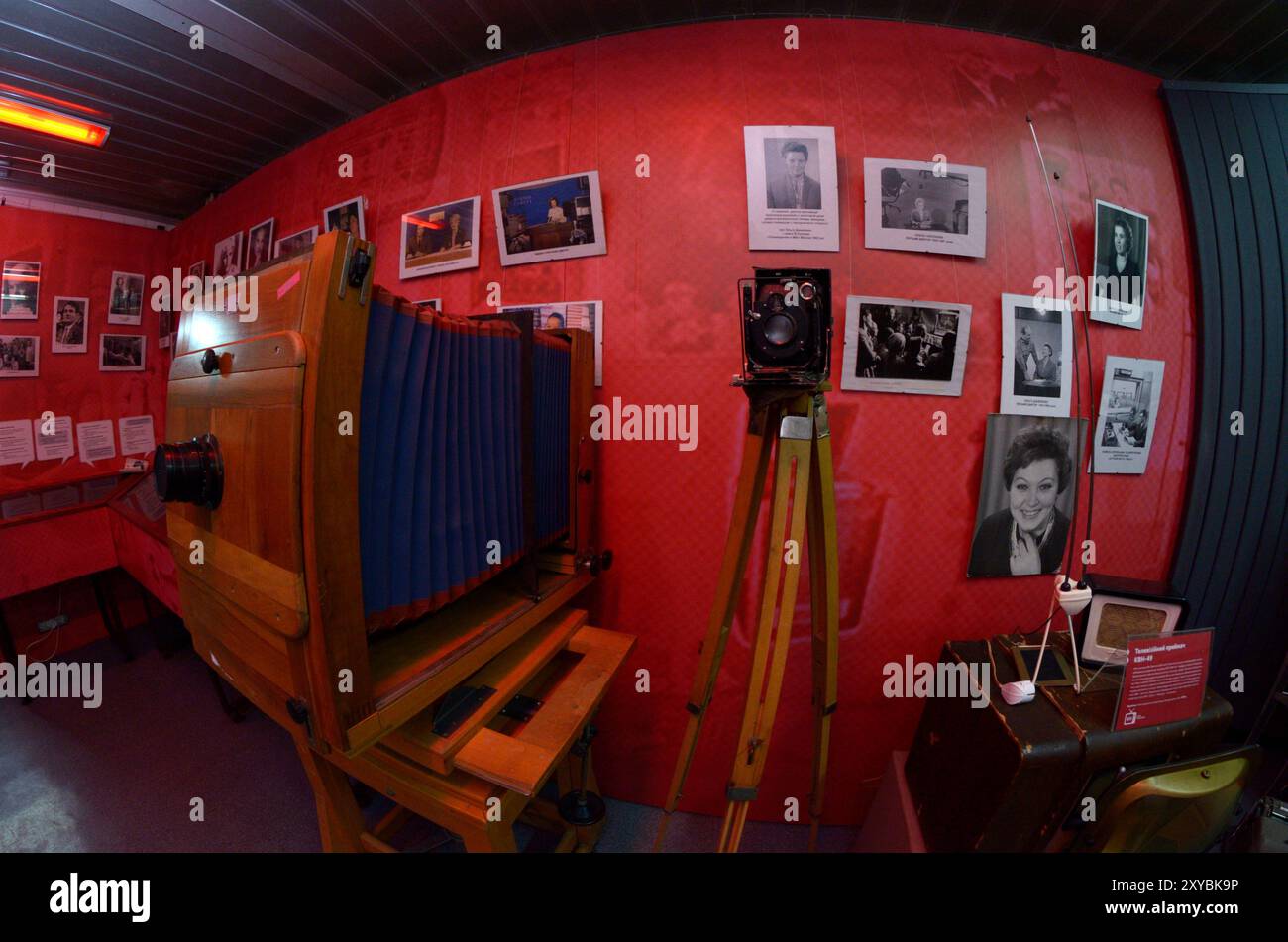 Retro 50-60 s tv studio. Vintage television cameras, portraits of news ...