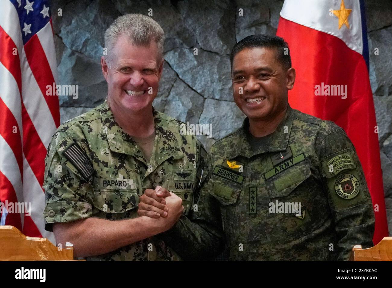 U.S. Indo-Pacific Command Commander Admiral Samuel Paparo, left, and ...