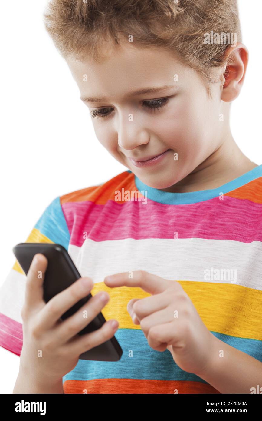Beauty smiling child boy hand holding mobile phone or talking ...