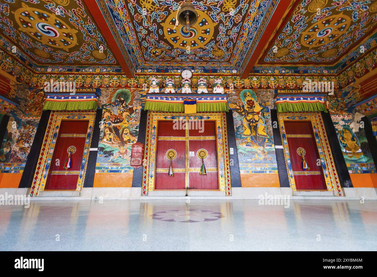 A low angle view of the beautifully painted doors and ceiling of the ...