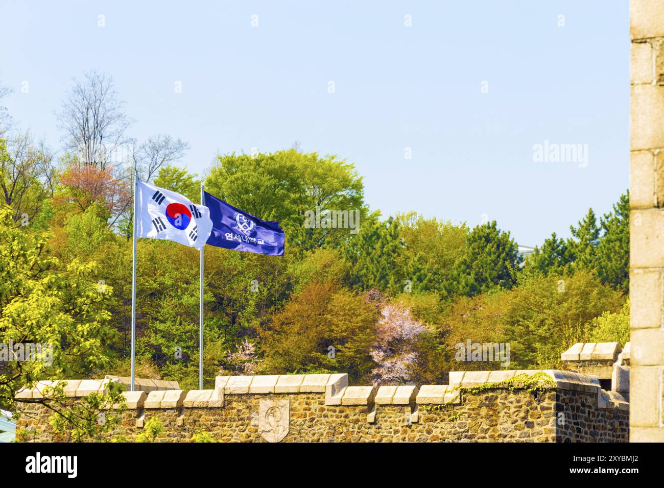 The flag of Yonsei University and national Korean Taegukgi flag flying ...