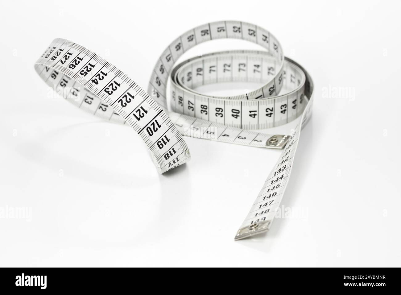 Measuring tape on a white background Stock Photo - Alamy