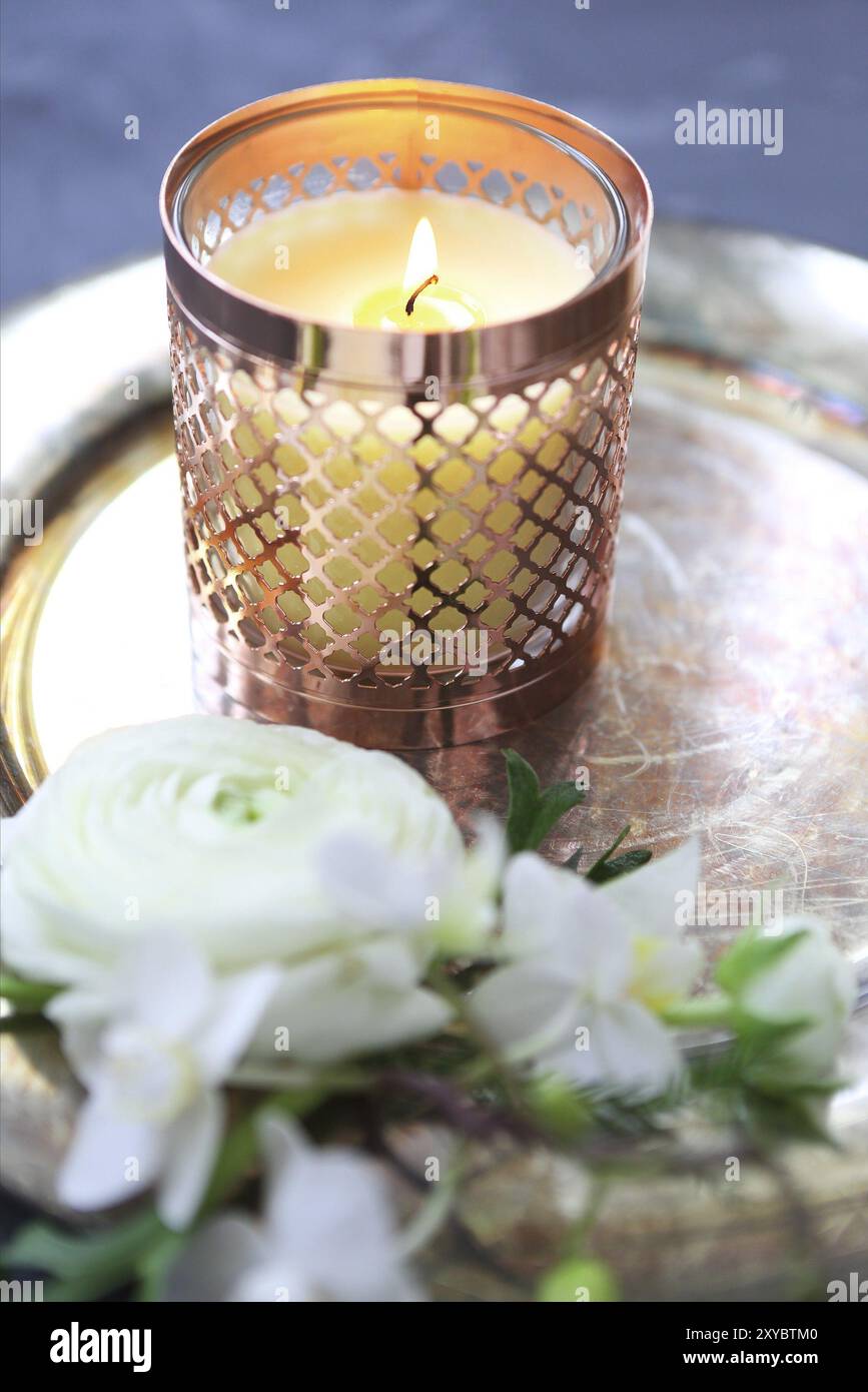 Festive invitation card with beautiful flowers and tray with burning ...