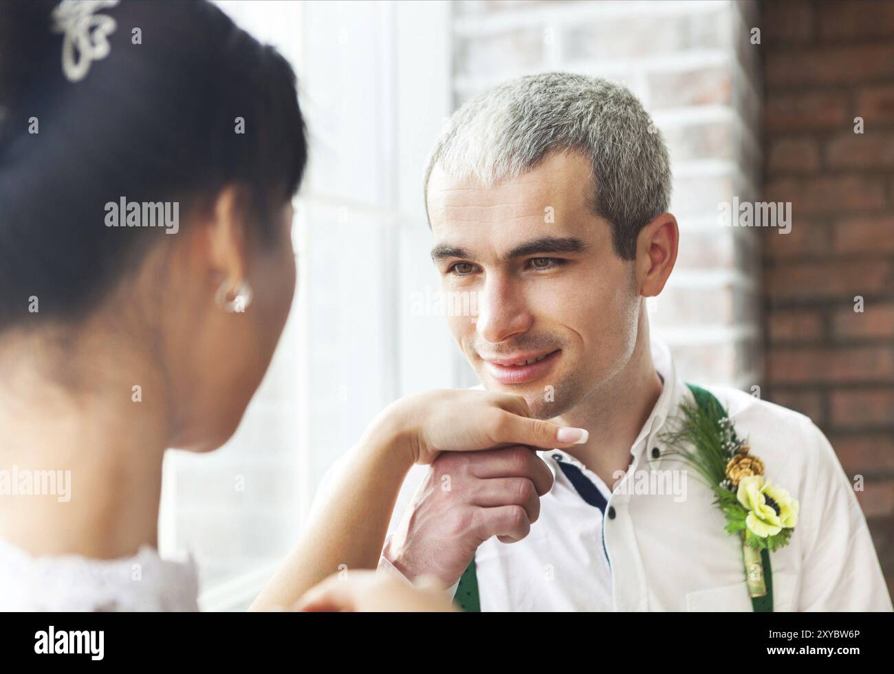Young tender pair standing on hi-res stock photography and images - Alamy