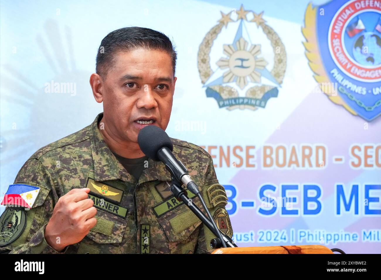 Philippine military chief Gen. Romeo Brawner Jr.,gestures during a press conference with U.S ...