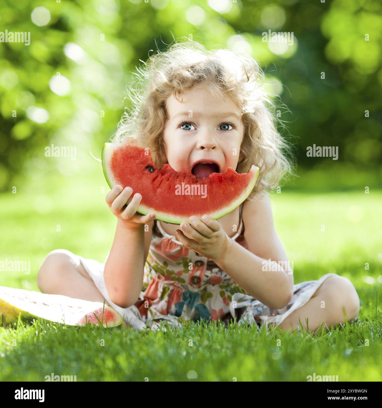 Child eats outdoor on sunny hi-res stock photography and images - Alamy