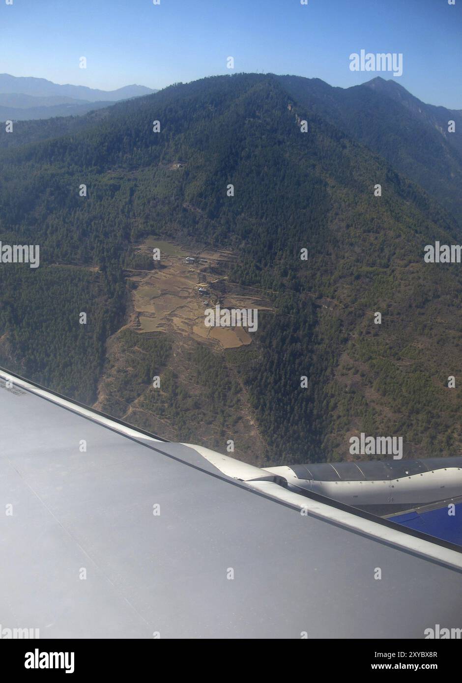 View out of the window of a Druk Air Airbus 319 in the Paro valley ...
