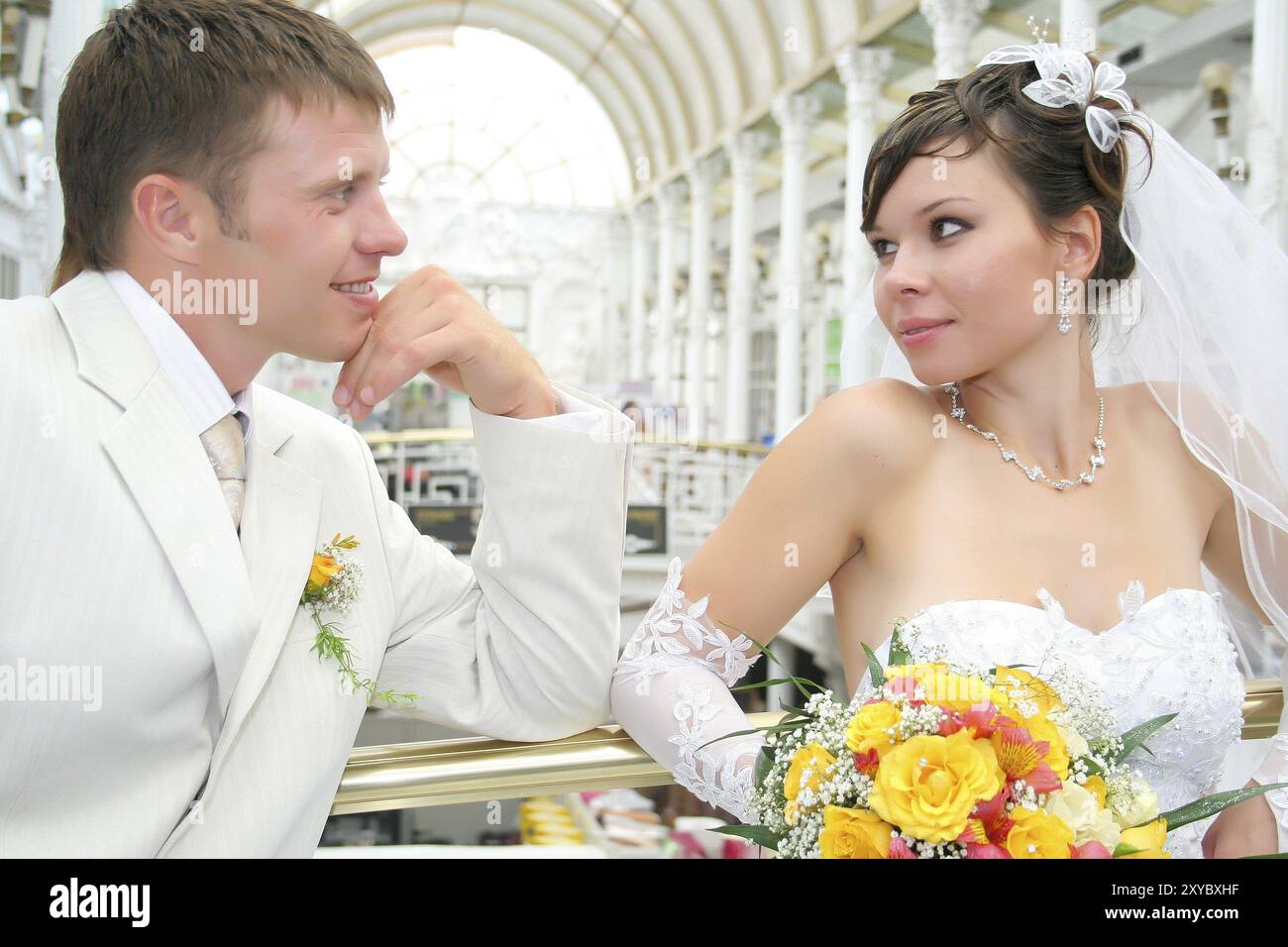 Newly married together in a photo pose Stock Photo - Alamy