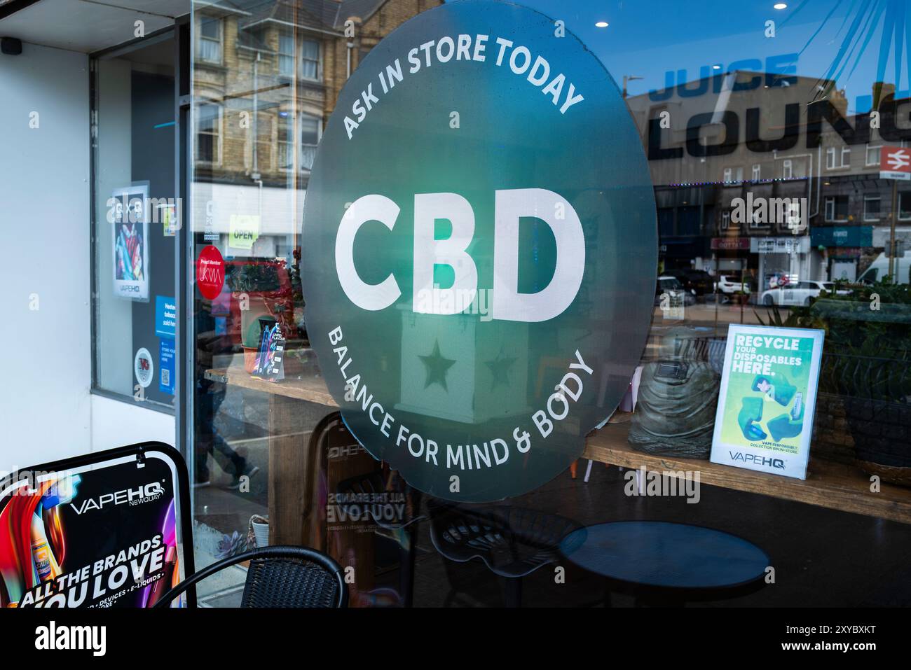 A large sign in the window of a CBD shop store in Newquay in Cornwall ...
