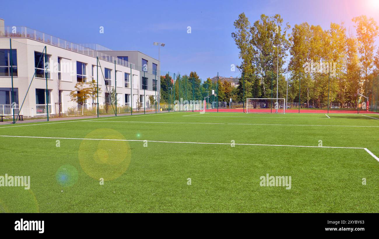 Artificial turf football pitch near school Stock Photo - Alamy