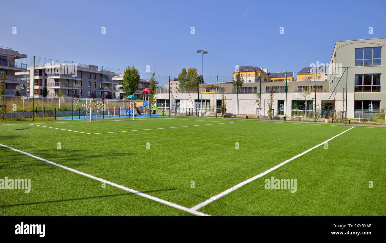 Artificial turf football pitch near school Stock Photo - Alamy