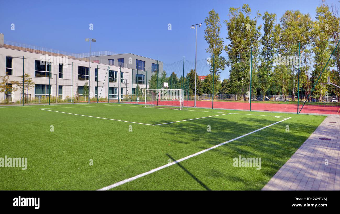 Artificial turf football pitch near school Stock Photo - Alamy