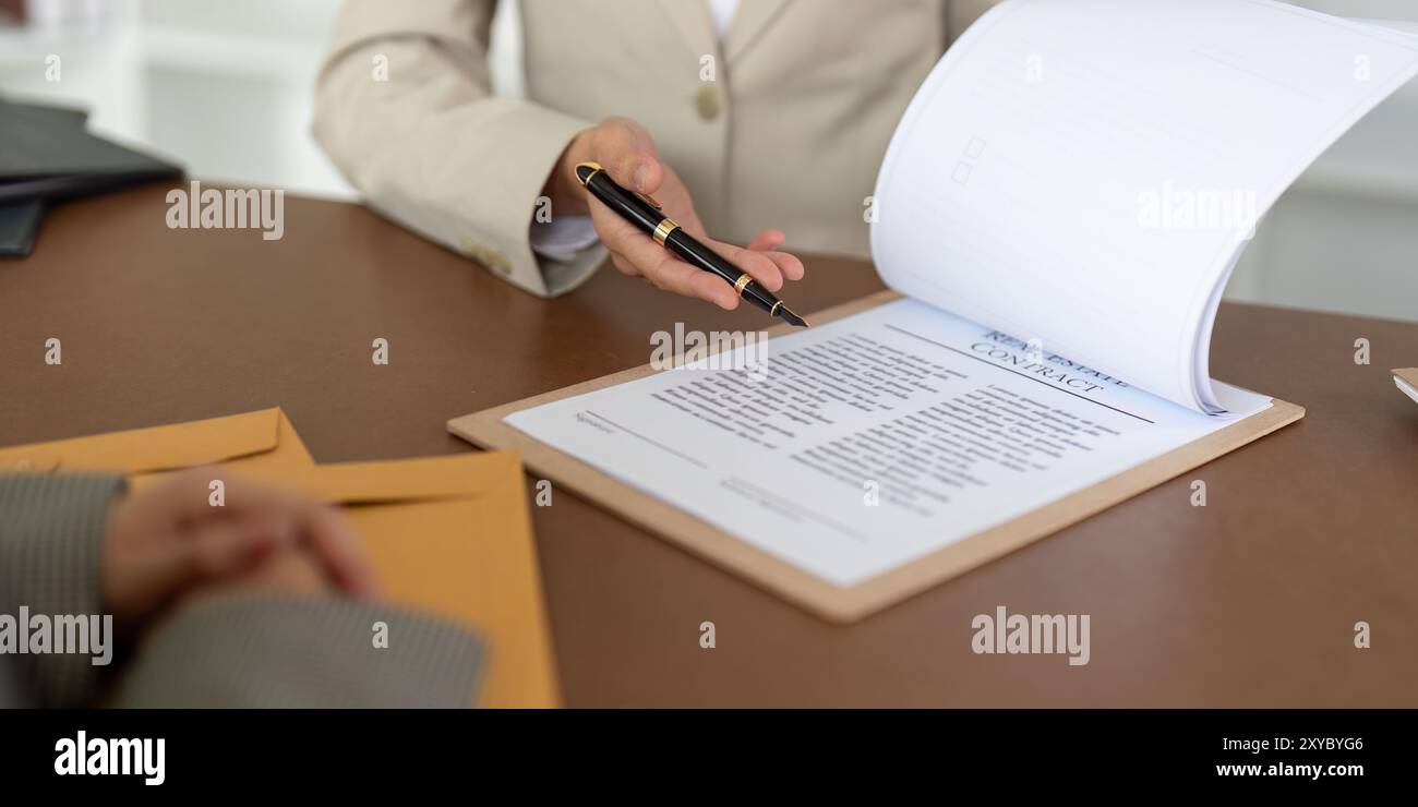 Attorney Presenting Contract to Client. Legal Document Analysis Stock ...