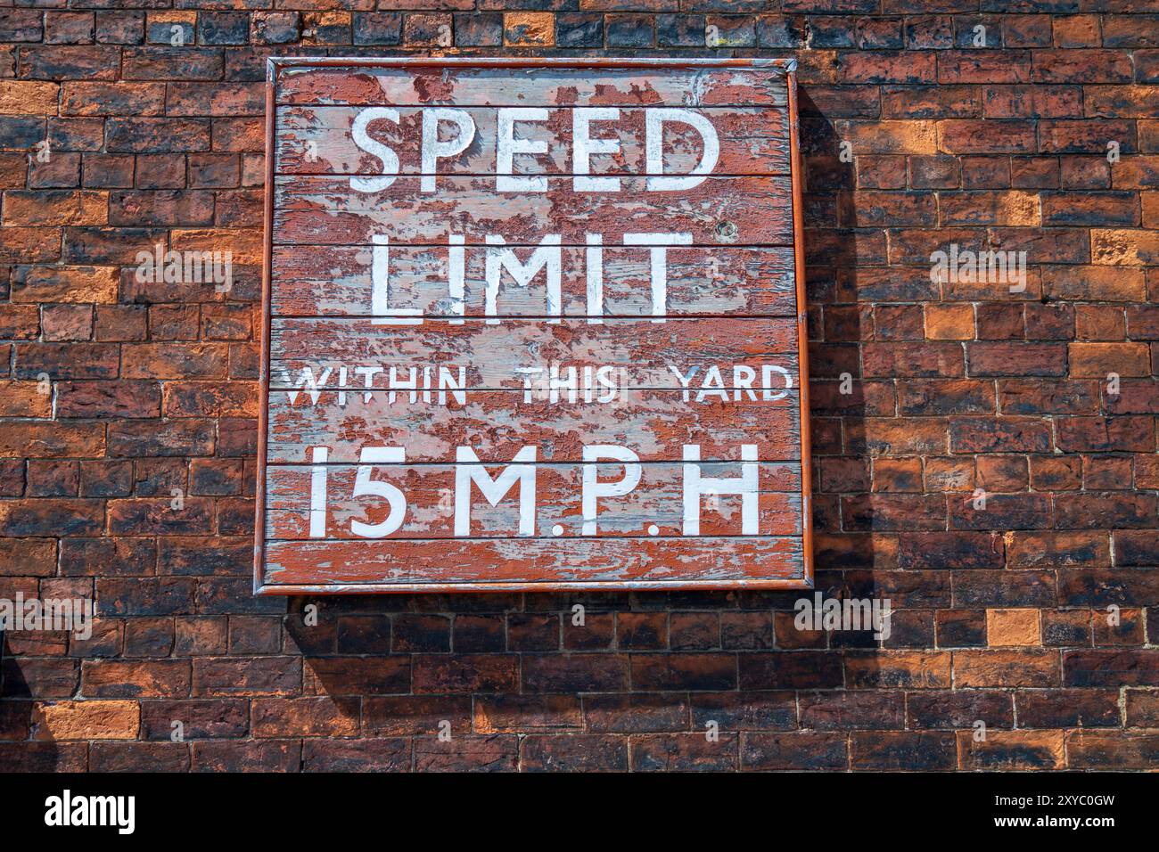 Vintage speed limit sign on a red brick wall in York, England, UK. Old ...