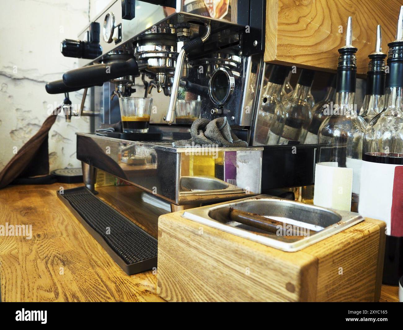 Espresso machine making coffee in pub, bar, restaurant. Toned photo ...