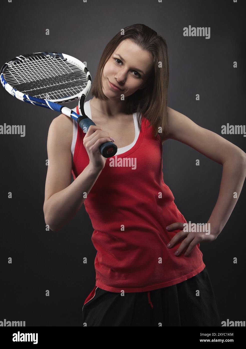 Portrait of sporty teen girl tennis player with racket Stock Photo - Alamy