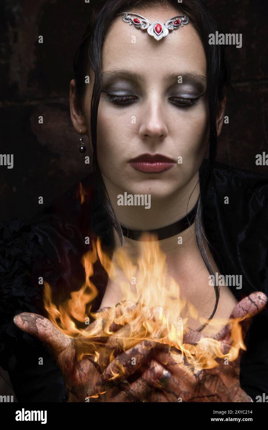 A woman with burning hands a woman with burning hands Stock Photo - Alamy