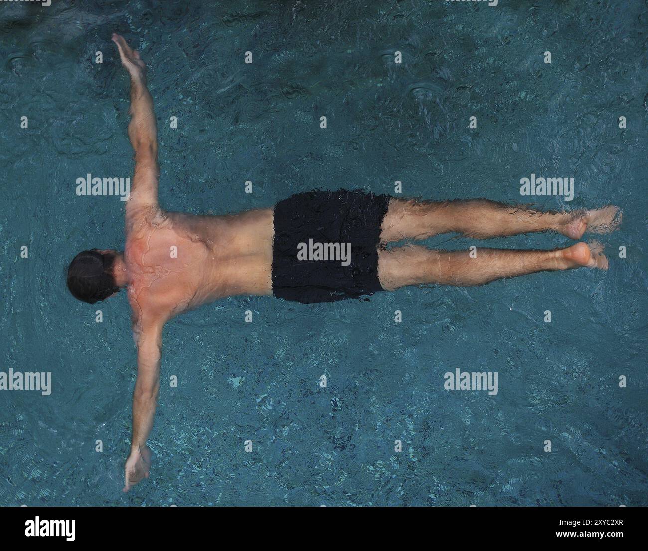 Good looking man in swimming pool hi-res stock photography and images ...