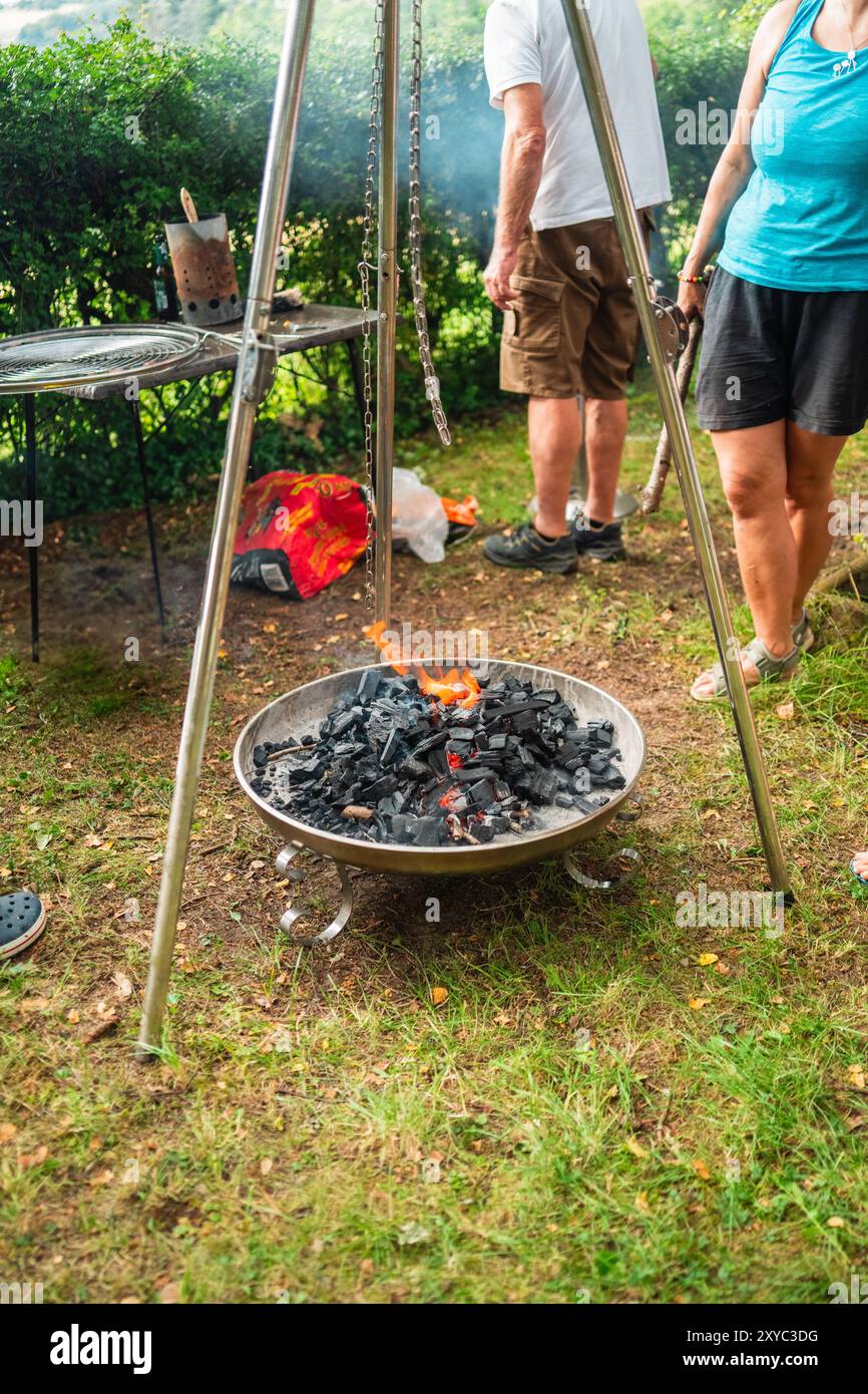 Barbecue Grill Campfire Hanging on a Tripod Stand Burning Charcoal in ...