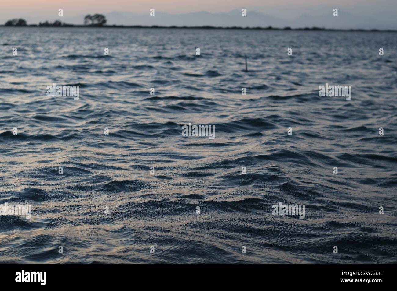 sea waves pattern sunset Stock Photo - Alamy