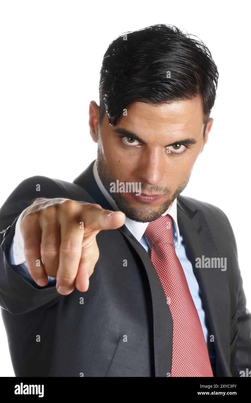 Businessman pointing towards camera over a white background Stock Photo ...