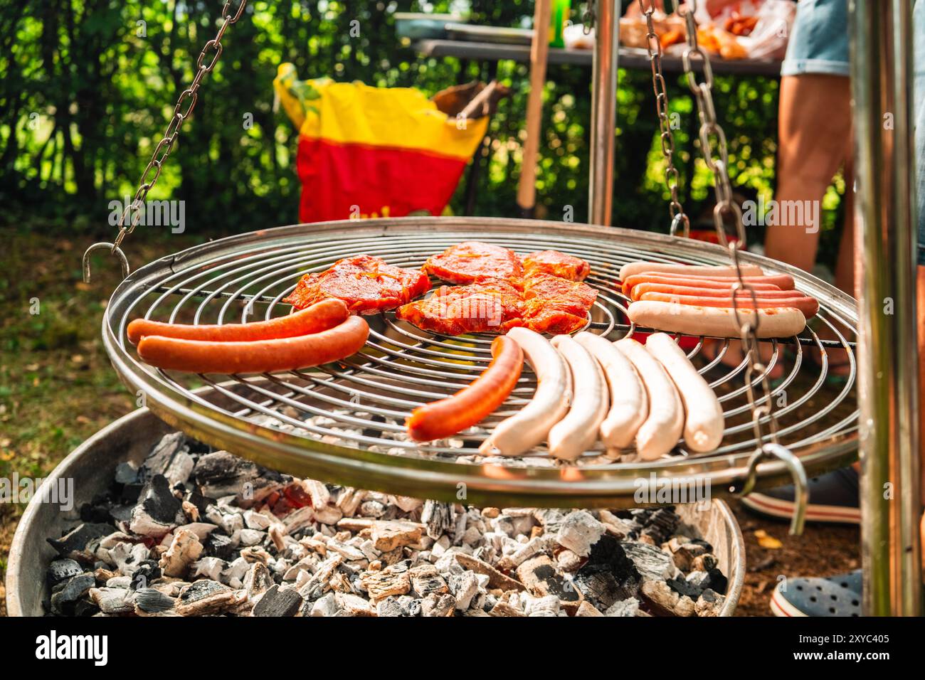 Steak and Sausage Roasted on the Grill Grate Over the Hot Coal During ...