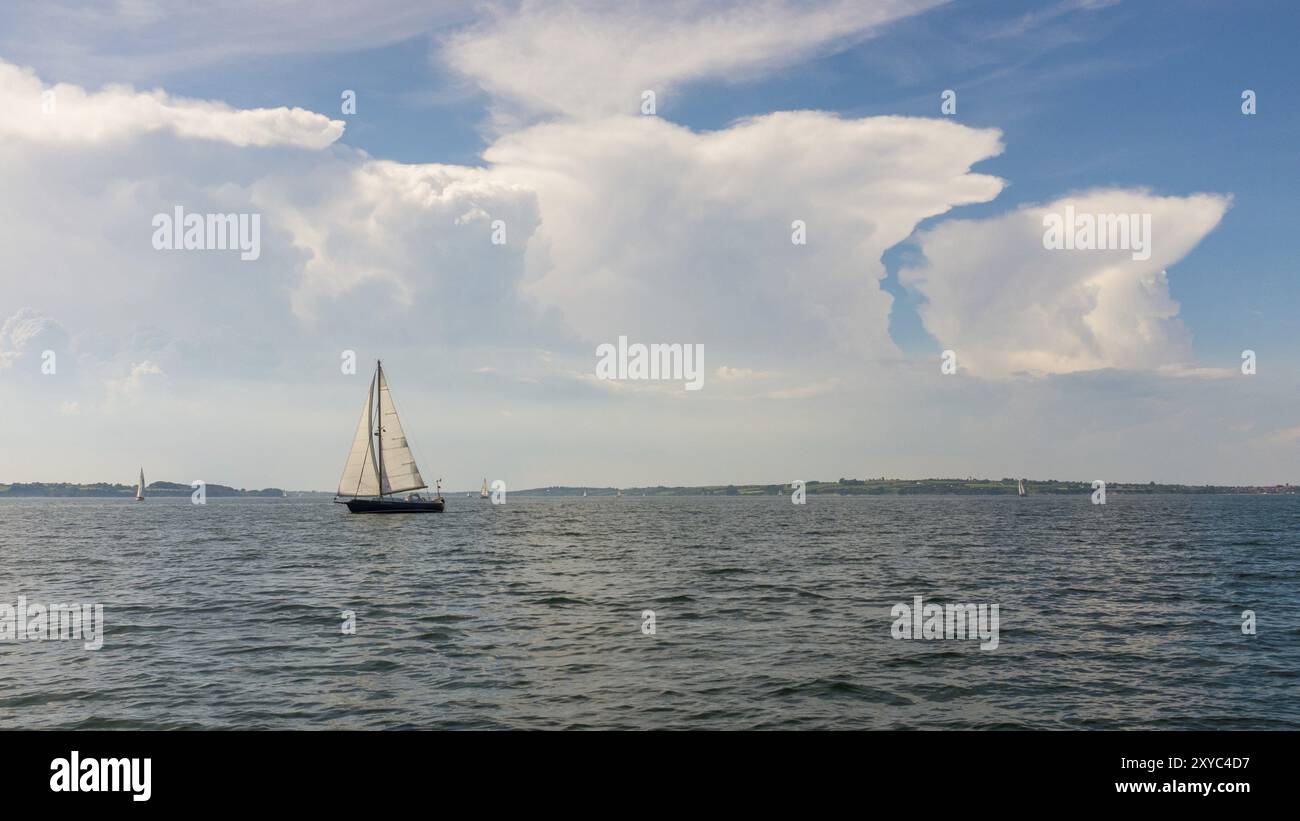 Sailing yacht in front of clouds. Sailing yacht in front of cloud Stock ...