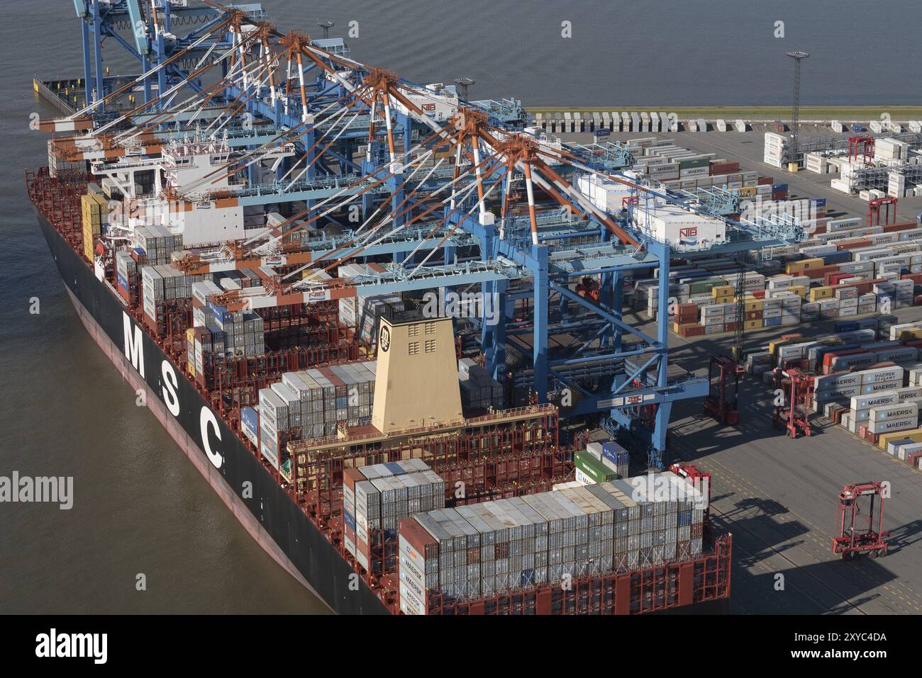 Container vessel MSC Maya during charging. Vessel MSC Maya during ...