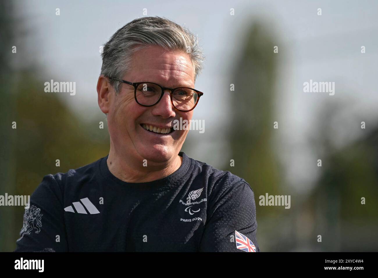 Britain's Prime Minister Keir Starmer reacts as he visits a training ...