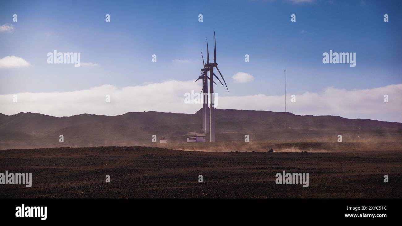 Windmills in the desert Stock Photo - Alamy