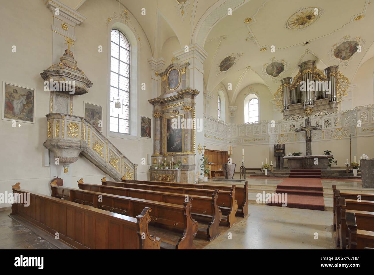 Interior view of the town church of St. Symphorian, pulpit, altar ...