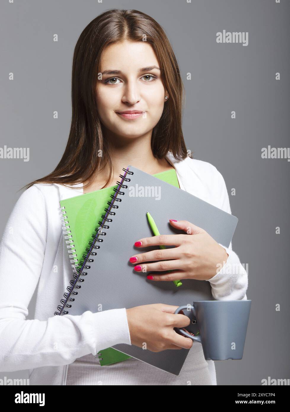 Casual dressed high school student girl smiling Stock Photo - Alamy