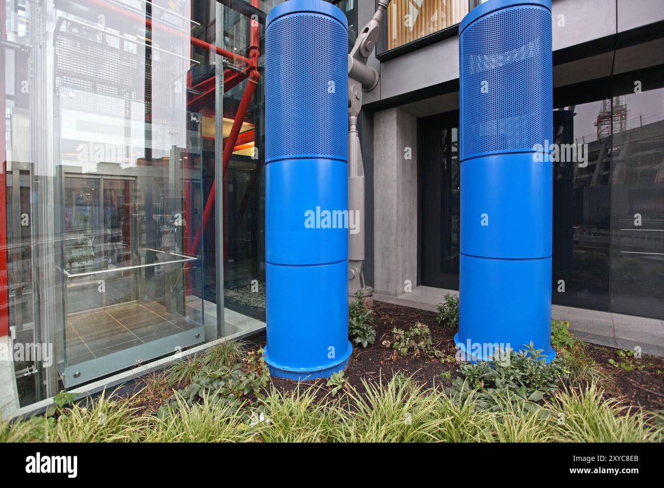 Tall Blue Ventilation Outlet Towers at Modern Office Building in City ...