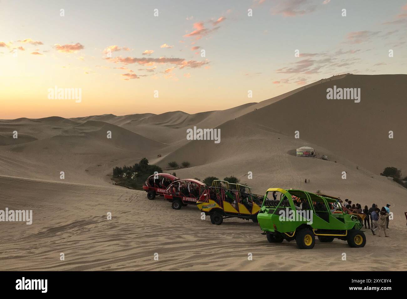 Huacachina Oasis in Ica, Peru. Dune Buggies cars parked in the desert ...